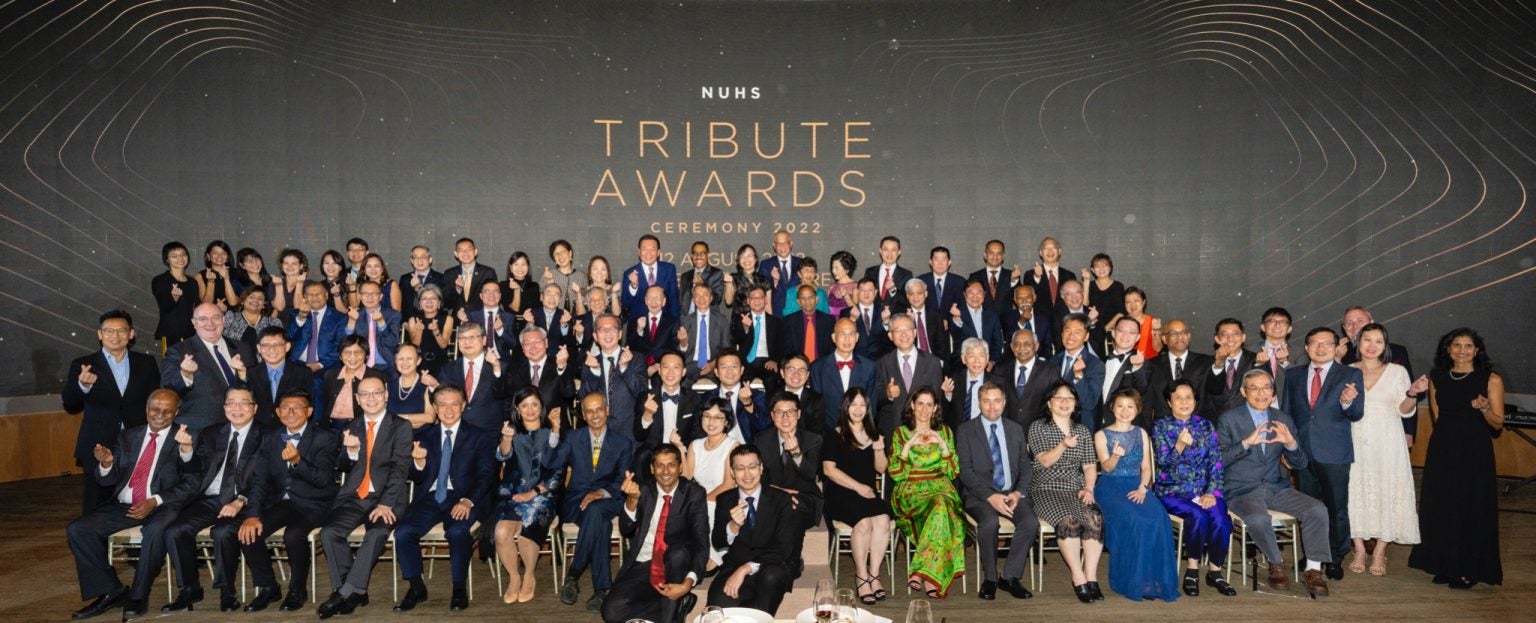 Prof Emily Ang presented with the Excellence Award at the NUHS Tribute ...